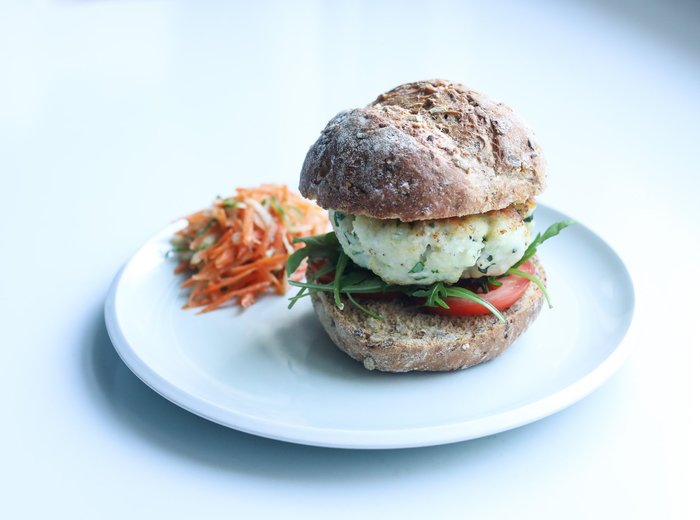 Nathan Outlaw’s cod burger served with a carrot and cucumber salad ...